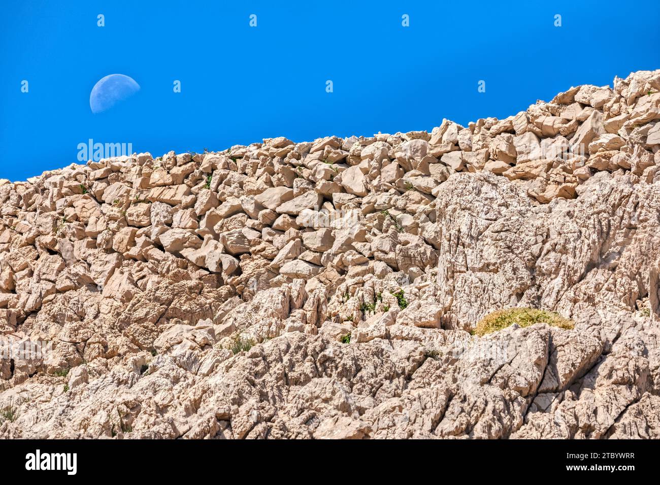 Daytime Moon over Rocky Landscape, Pag Island Stock Photo - Alamy