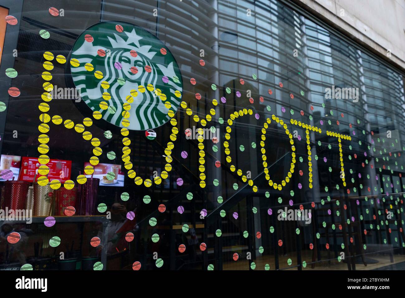 London, UK. 9th Dec, 2023. Stickers reading "Boycott" were plastered on ...