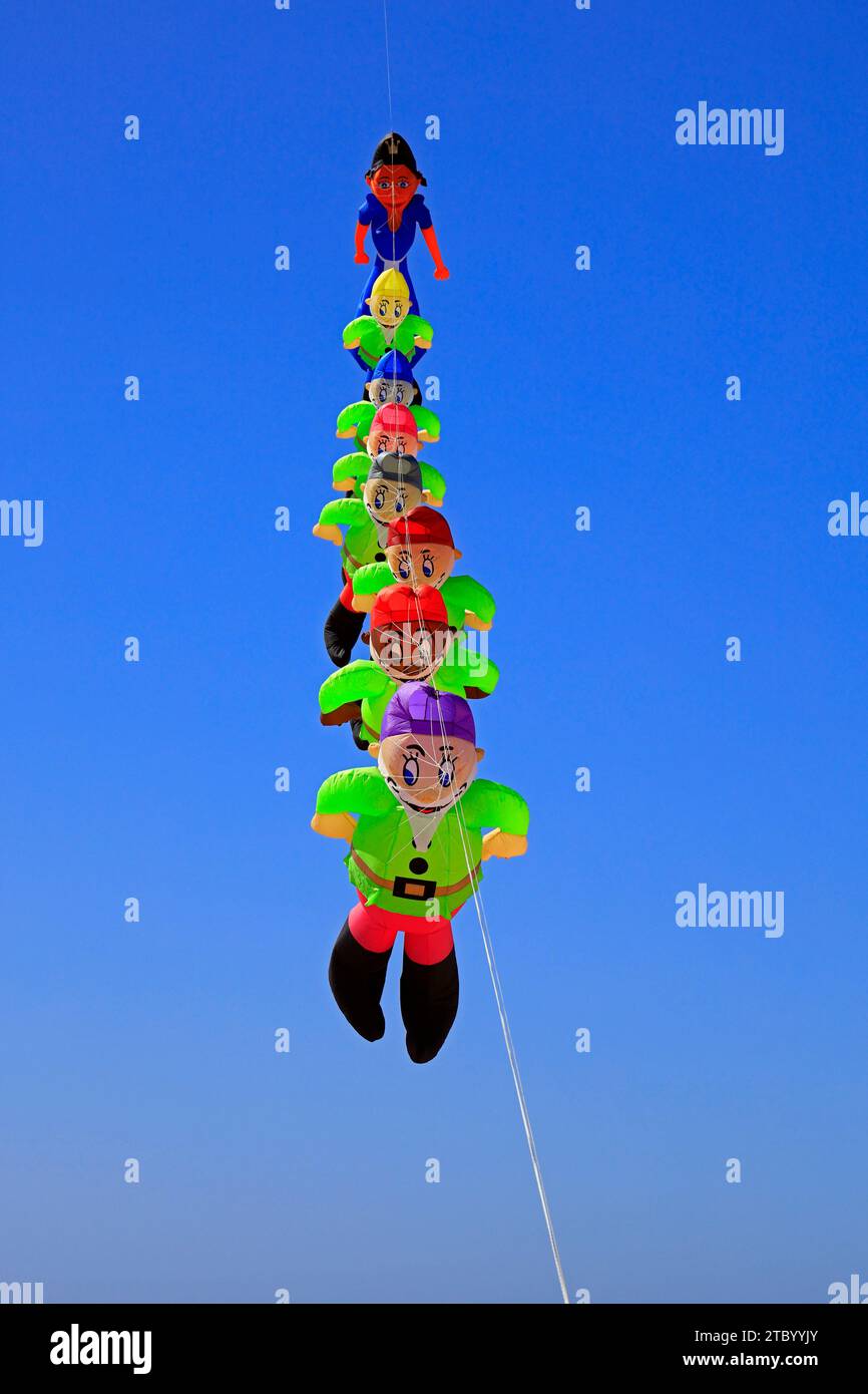 Snow White and The Seven Dwarfs kite flying over La Concha beach ...