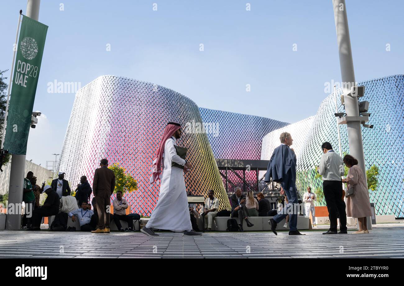 Dubai, United Arab Emirates. 09th Dec, 2023. People walk across the ...