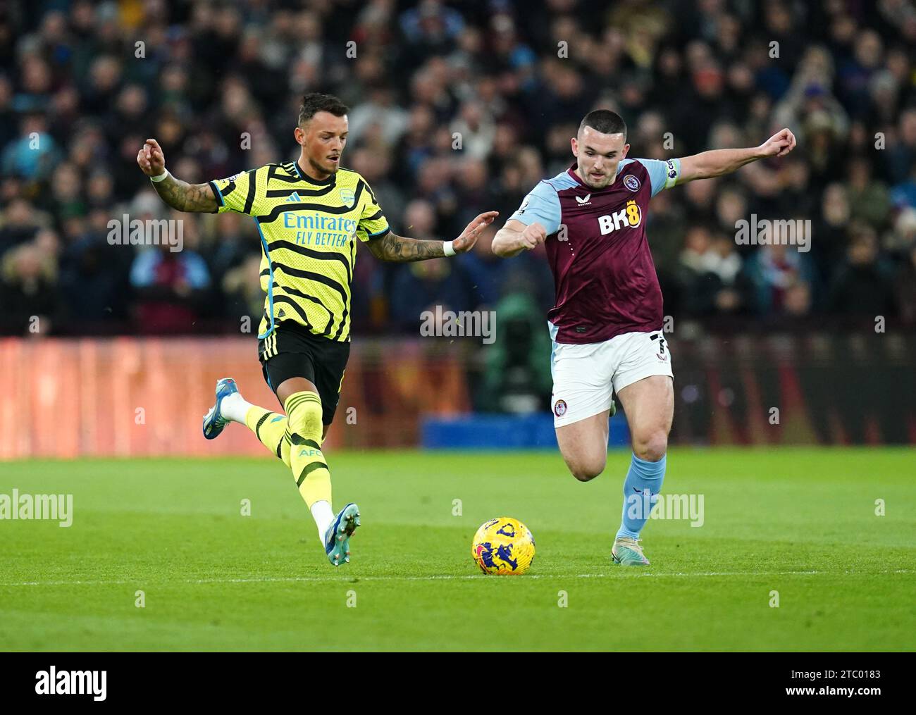 Arsenal's Ben White (left) and Aston Villa's John McGinn battle for the ...