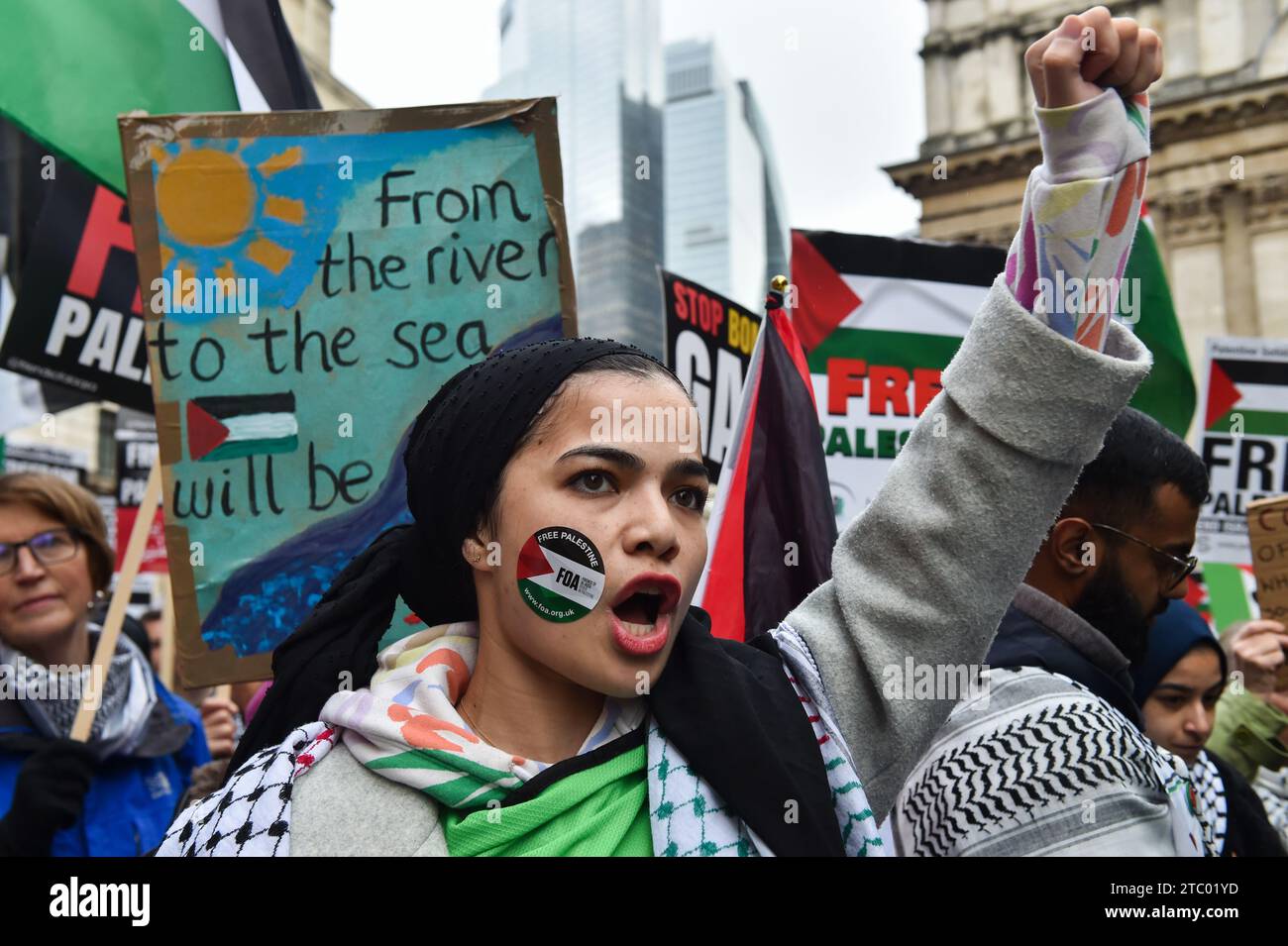 A woman shouts pro-Palestine slogans while participating in a ...