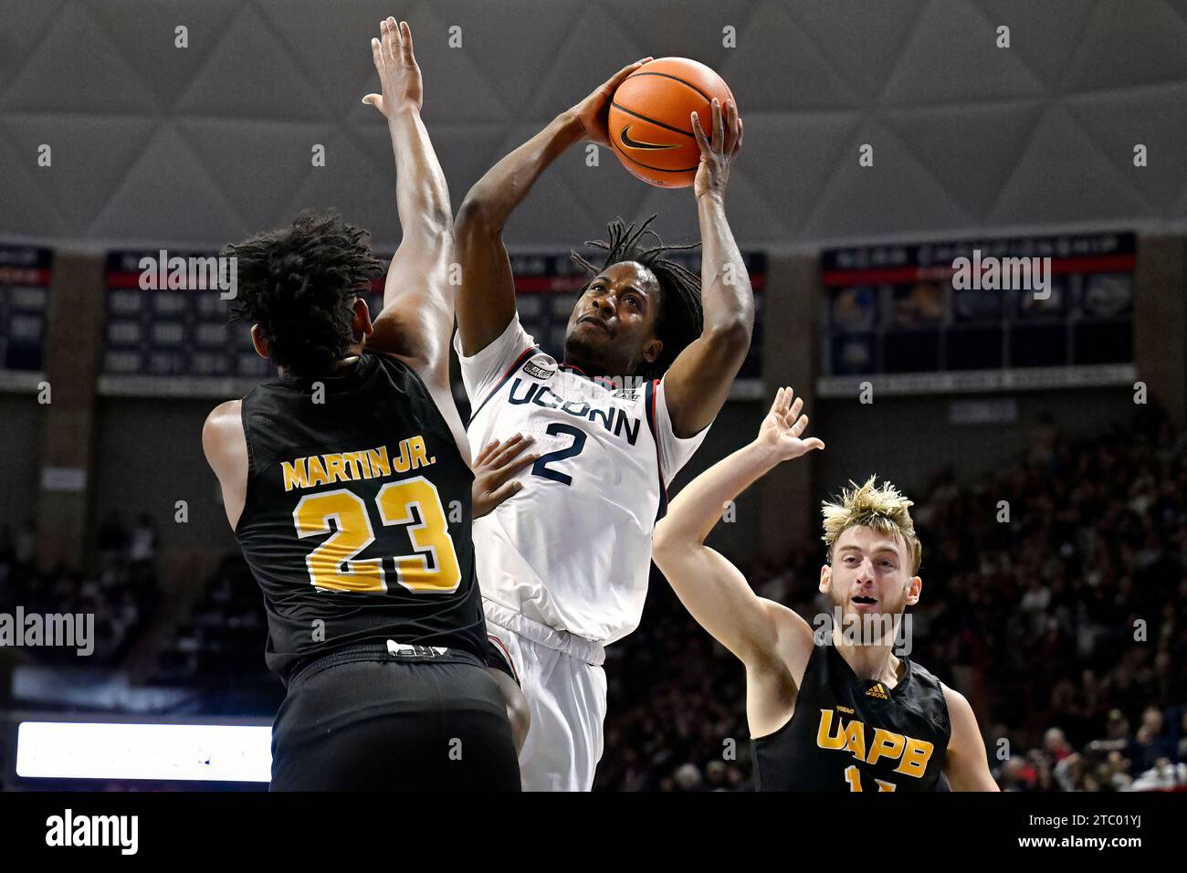 UConn guard Tristen Newton (2) is fouled by Arkansas-Pine Bluff forward ...