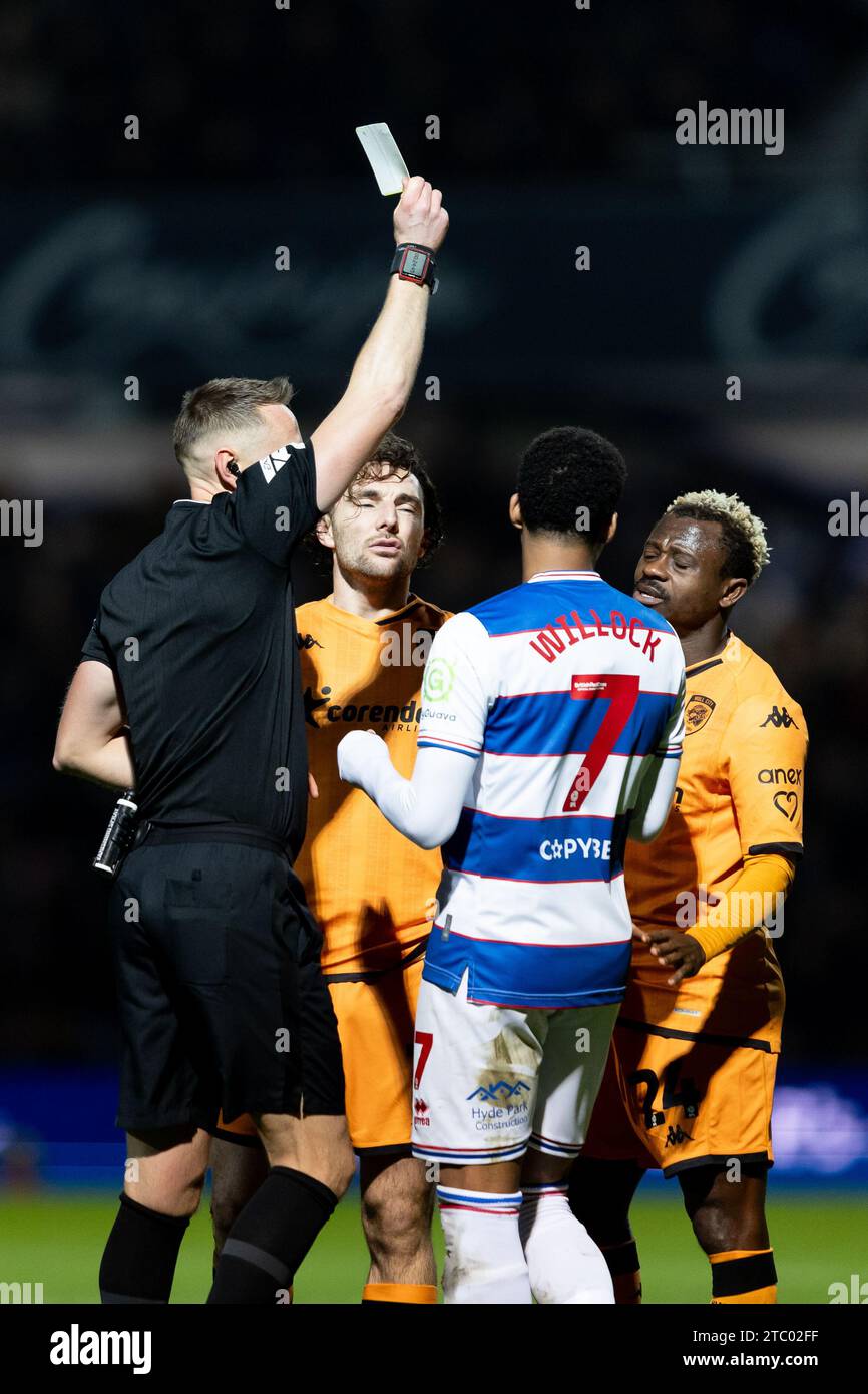 Jean Michaël Seri #24 of Hull City is shown a yellow card by match ...