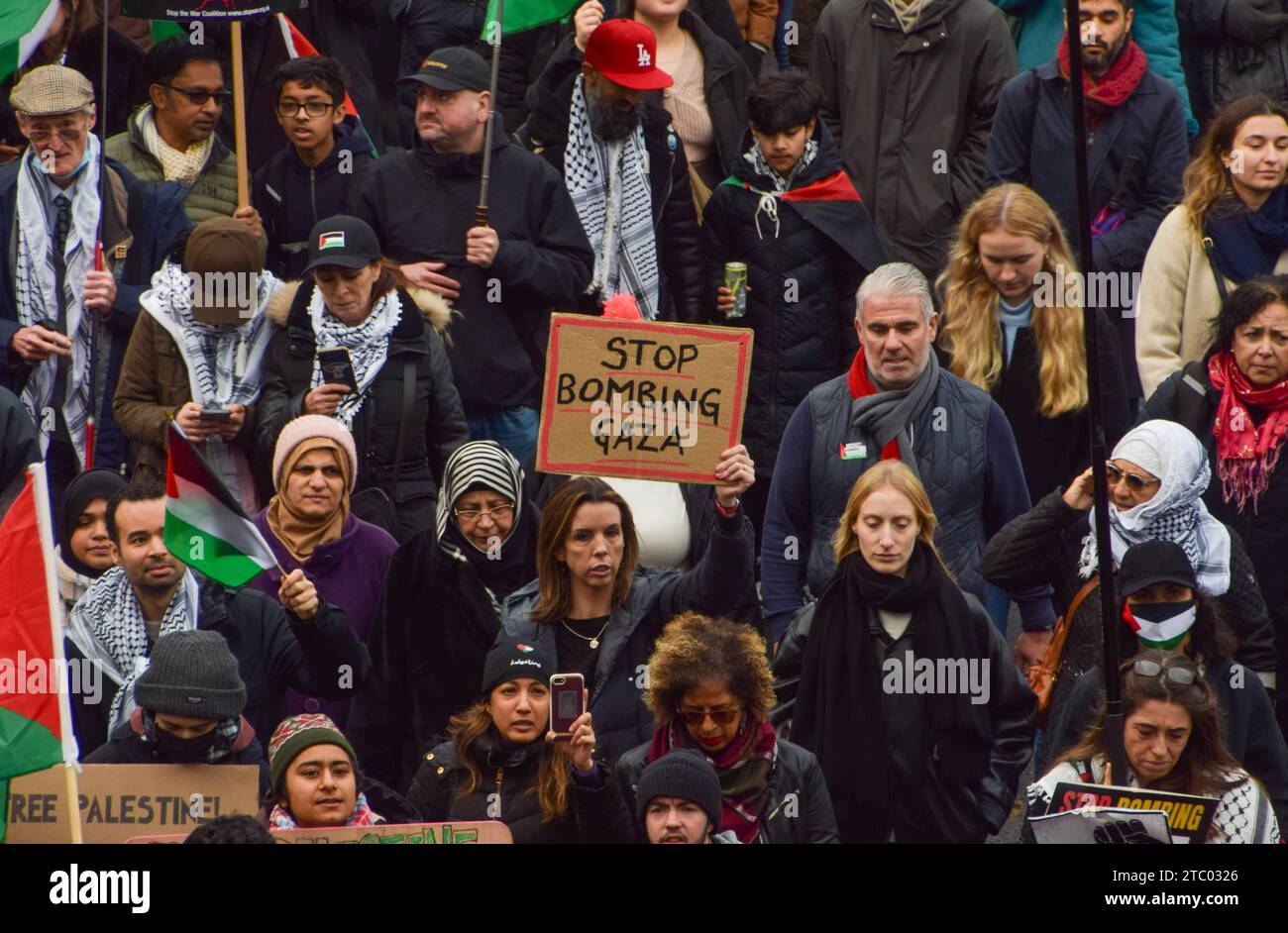 London, UK. 09th Dec, 2023. A protester holds a 'Stop bombing Gaza ...