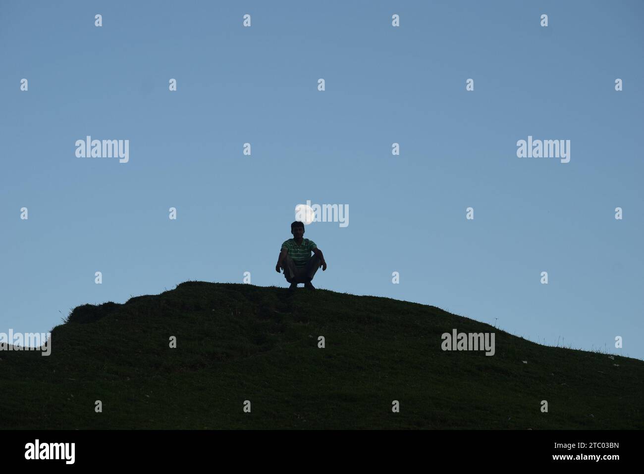 Moon overhead in Niladri Lake Stock Photo - Alamy