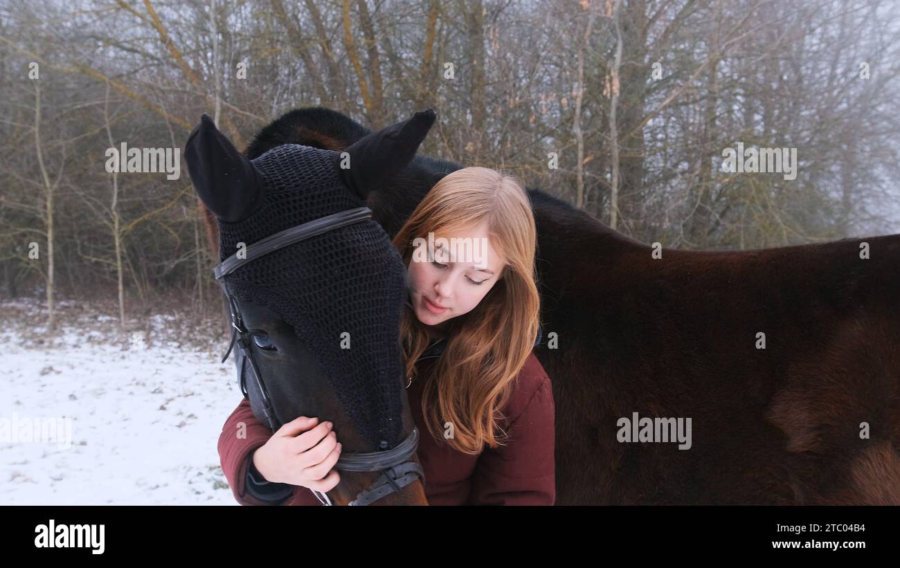 Young woman hugs horse hi-res stock photography and images - Alamy