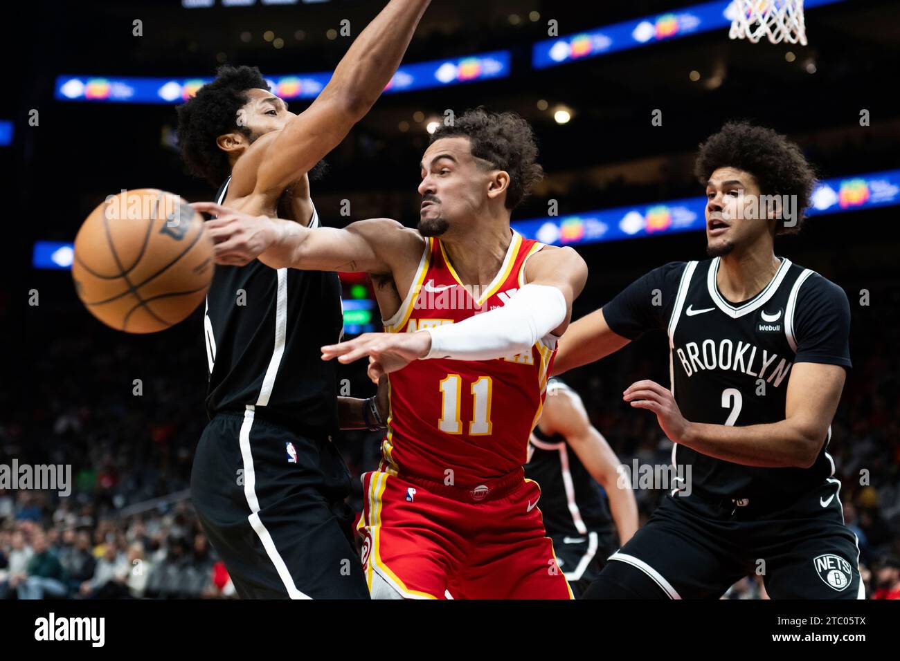 Atlanta Hawks guard Dejounte Murray (5) passes between Brooklyn Nets ...