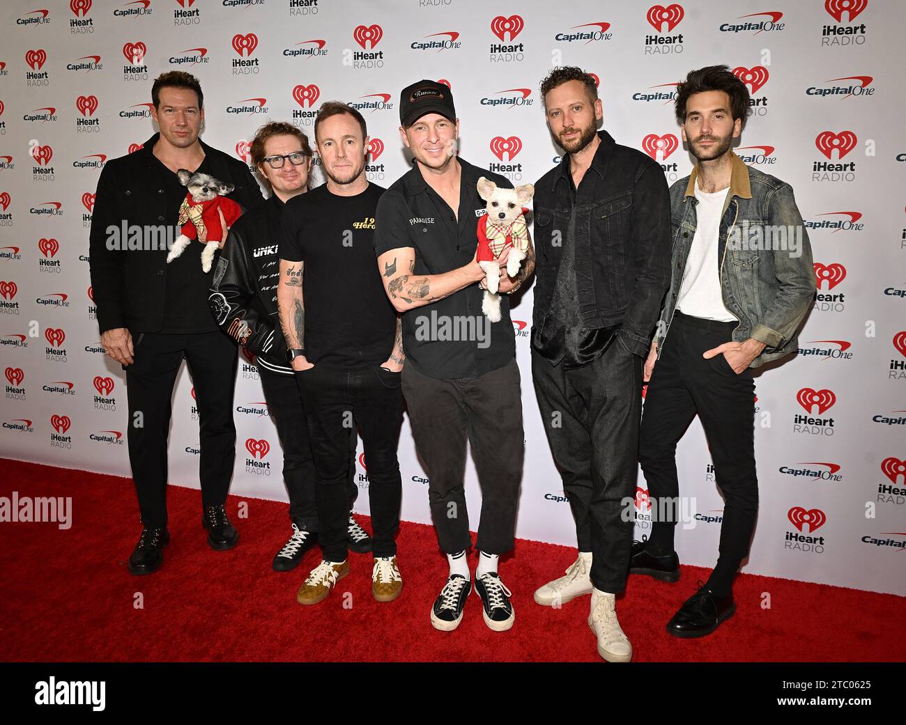 New York, USA. 09th Dec, 2023. Zach Filkins (holding Tinkerbelle The ...