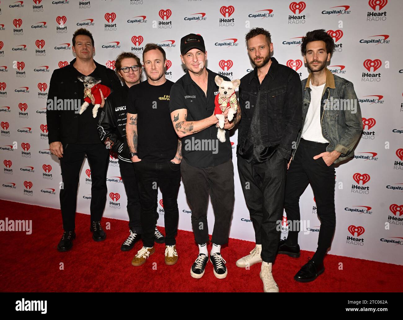 New York, USA. 09th Dec, 2023. Zach Filkins (holding Tinkerbelle The ...
