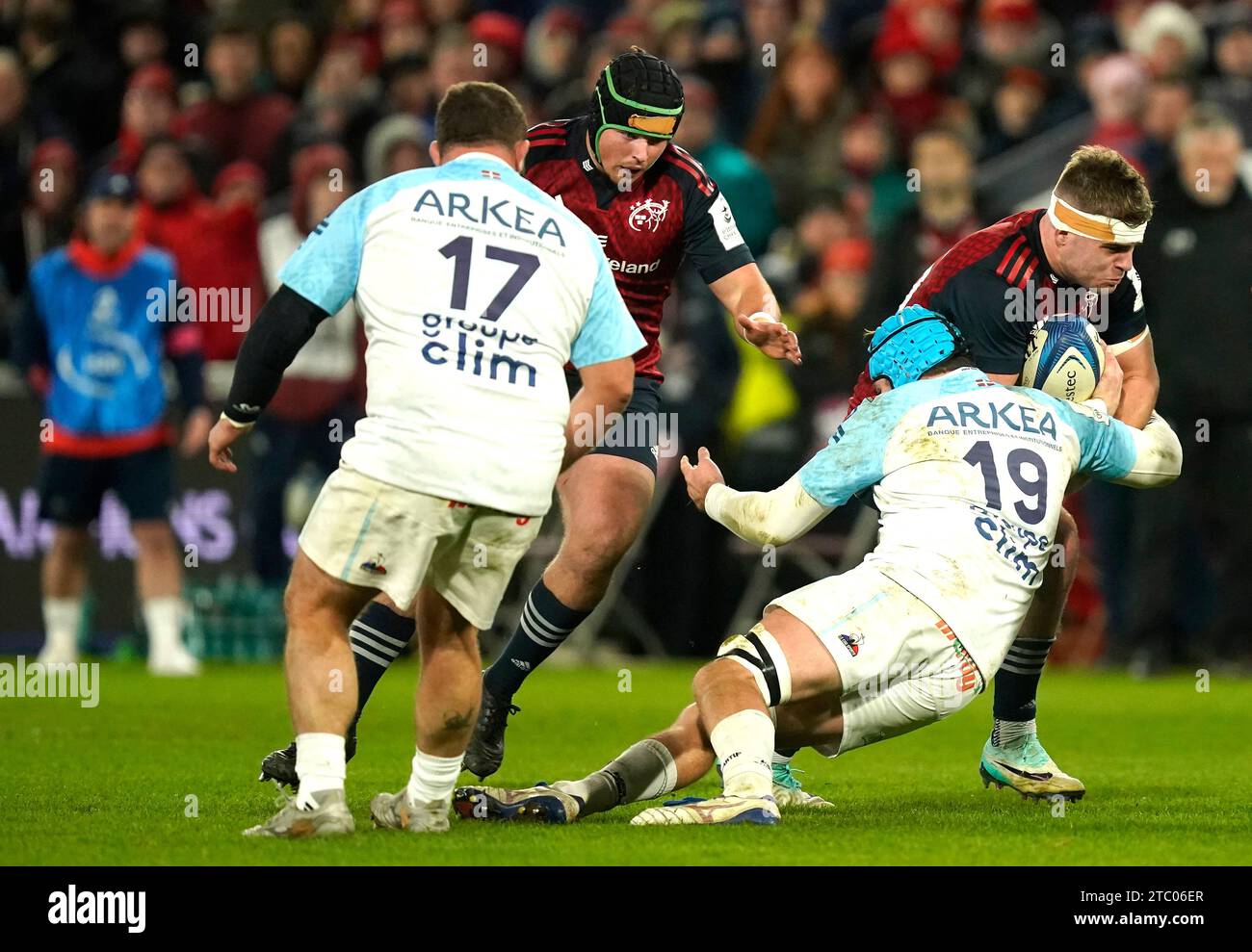 Munster's Alex Kendellen (right) is tackled by Bayonne's Arthur Iturria ...