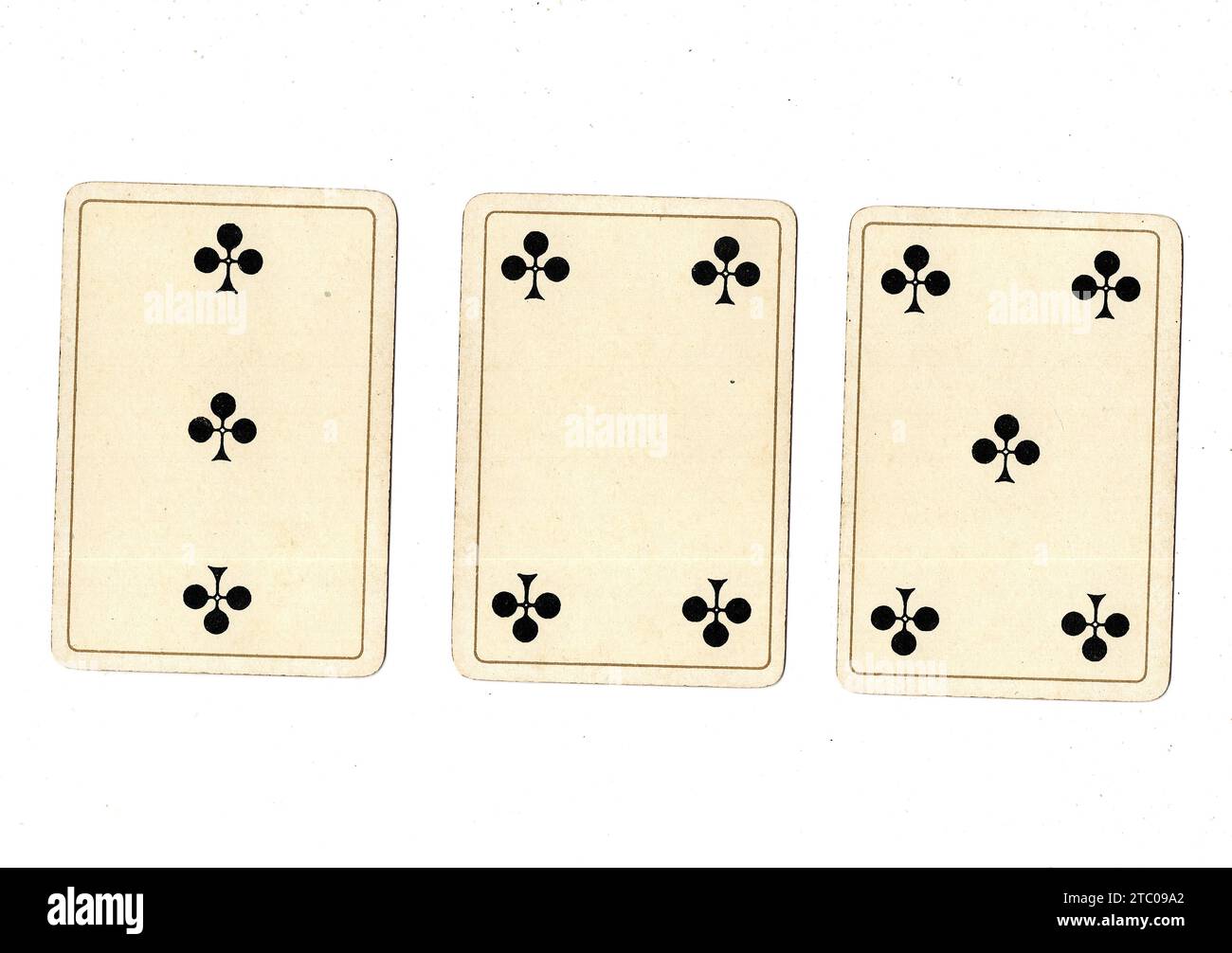 Vintage playing cards showing a run of three, four and five of clubs on ...