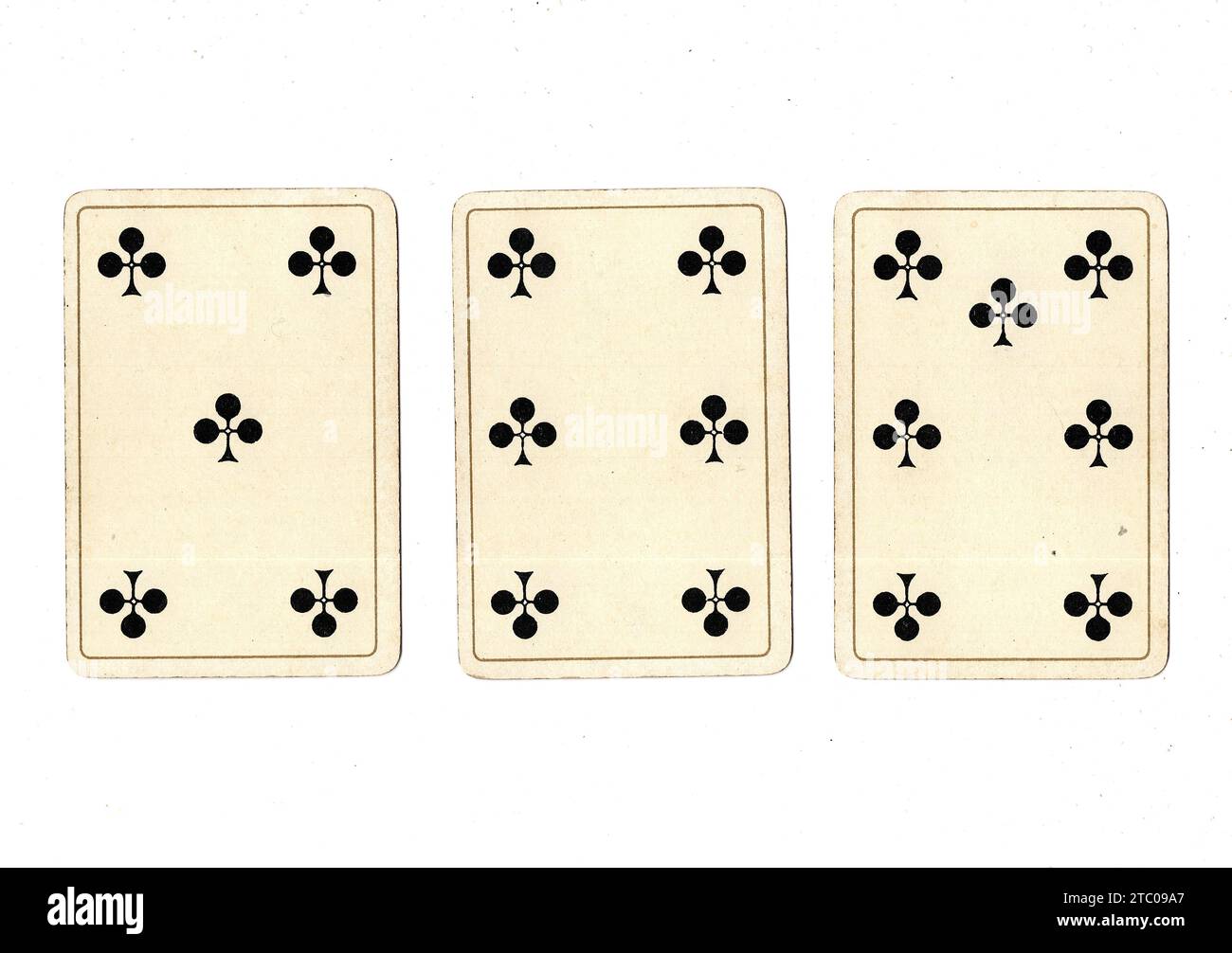 Vintage playing cards showing a run of five, six and seven of clubs on ...
