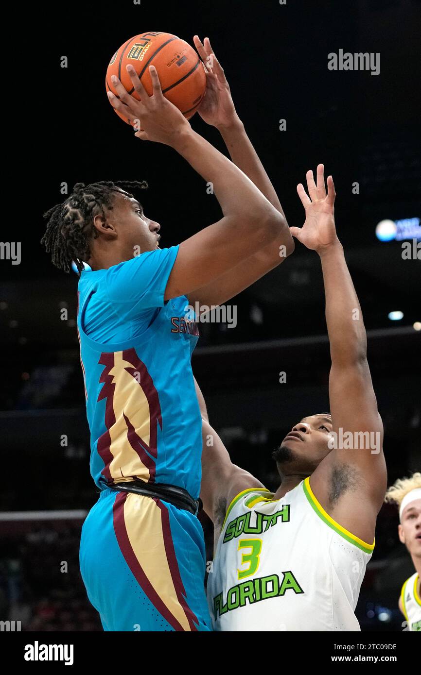 Florida State forward Baba Miller, left, goes to the basket as South ...
