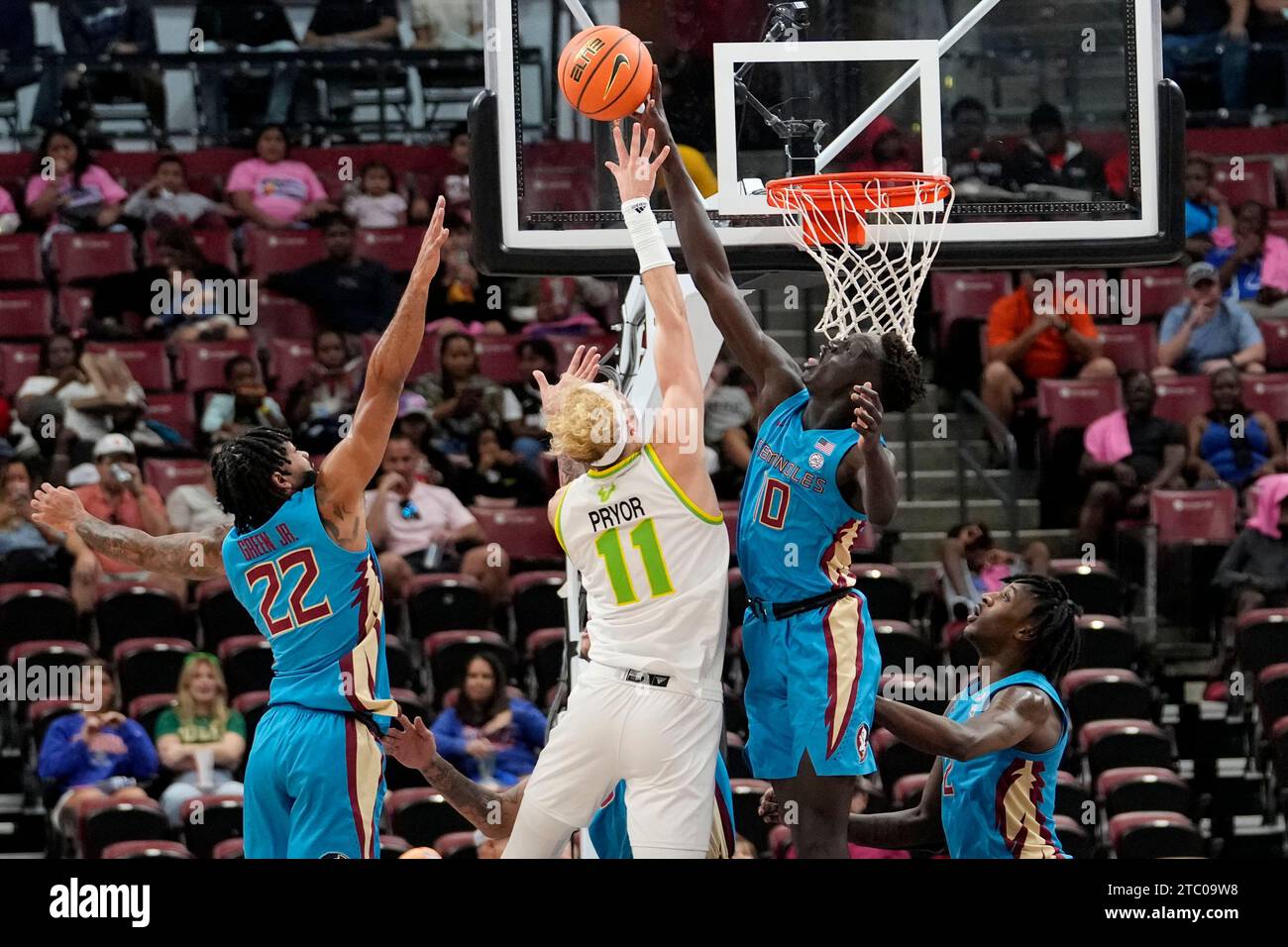 South Florida forward Kasean Pryor (11) goes to the basket as Florida ...