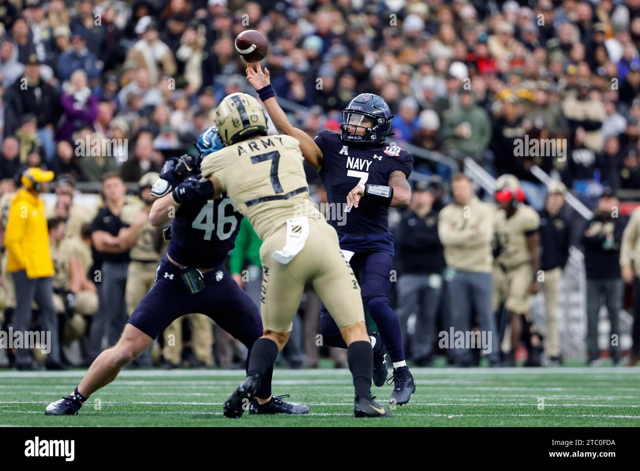 Navy quarterback Xavier Arline throws against Army during the first ...