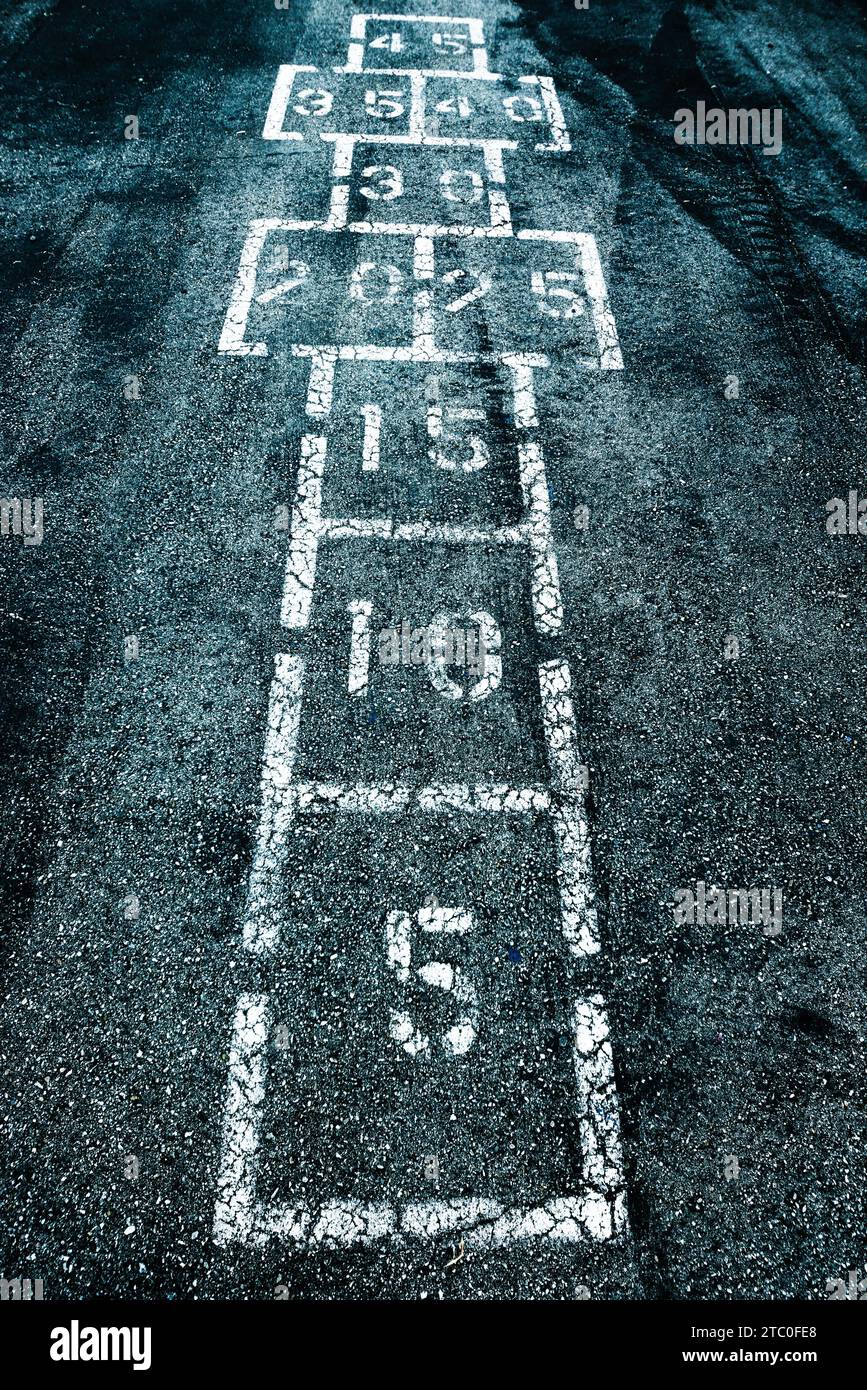 Classic American game of hopscotch stenciled onto a playground ...