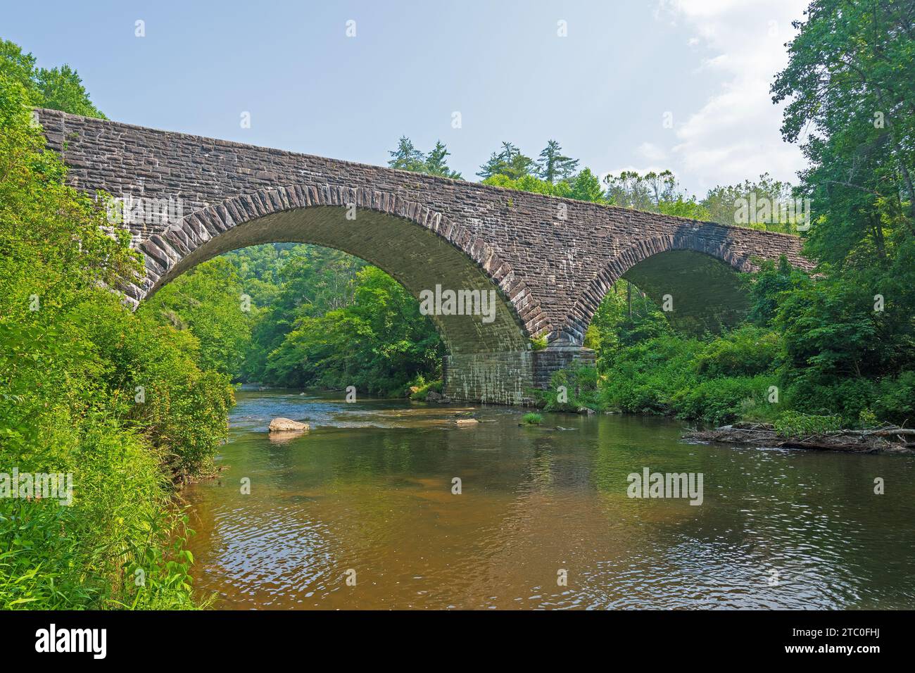 The Linville River Stone Arch Bridge Over a Quiet River in North ...