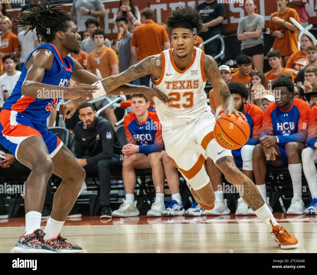 Texas, USA. 9th Dec, 2023. Dillon Mitchell #23 of the Texas Longhorns ...