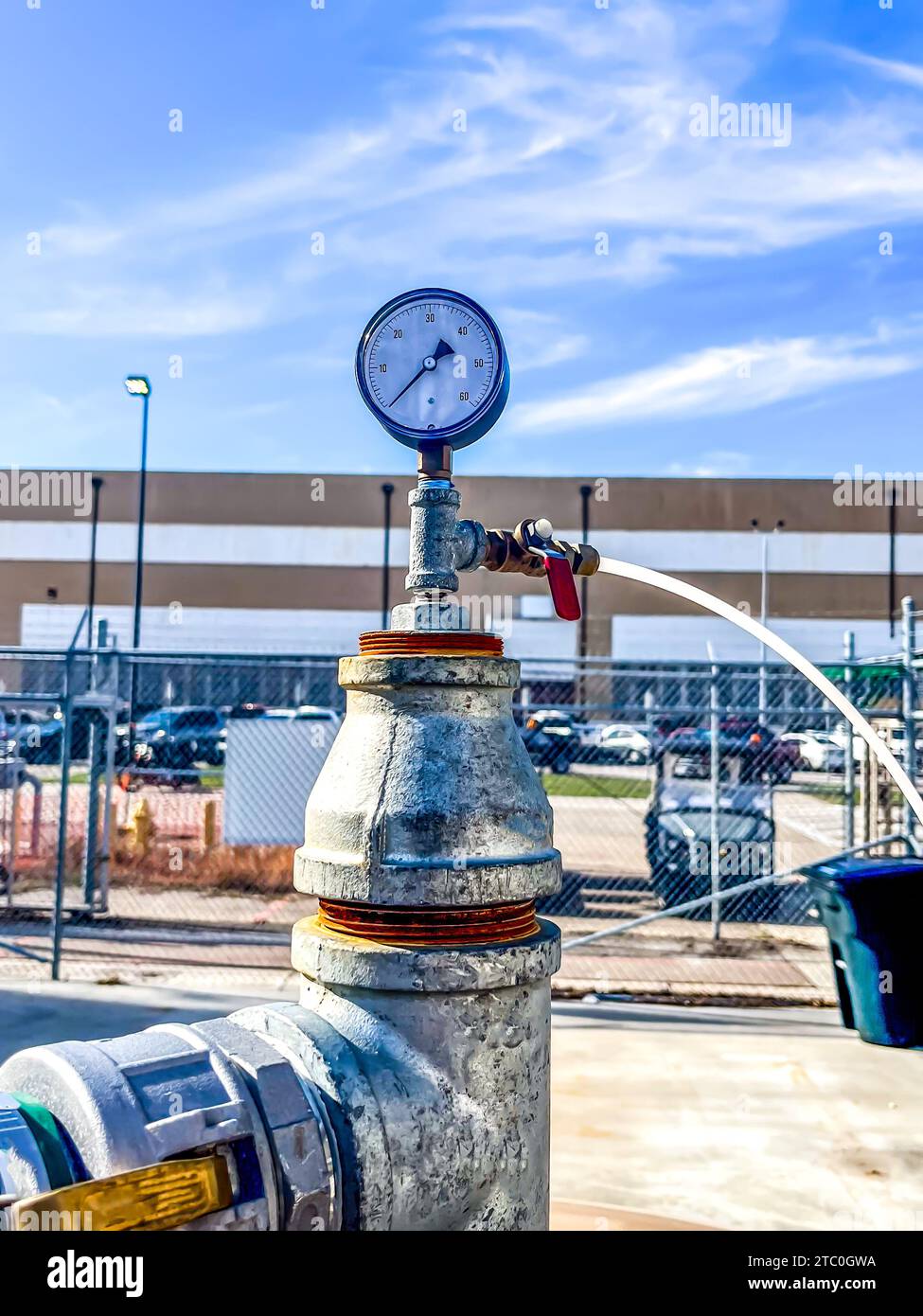 soil vapor extraction test well header with pressure gauge and sample ...