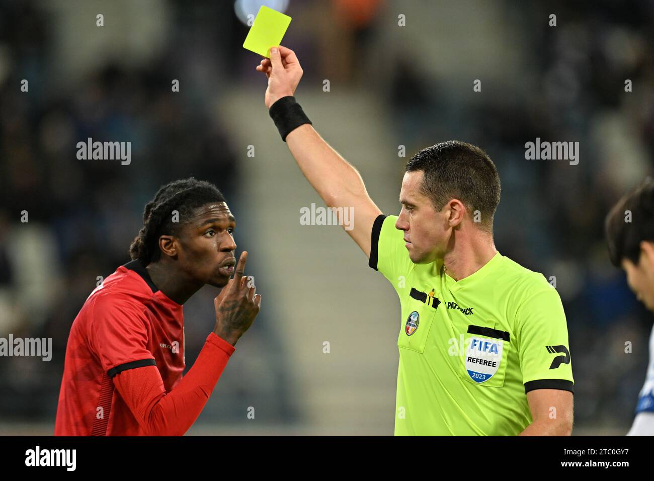 Gent, Belgium. 09th Dec, 2023. Pierre Dwomoh (6) of RWDM receives a ...