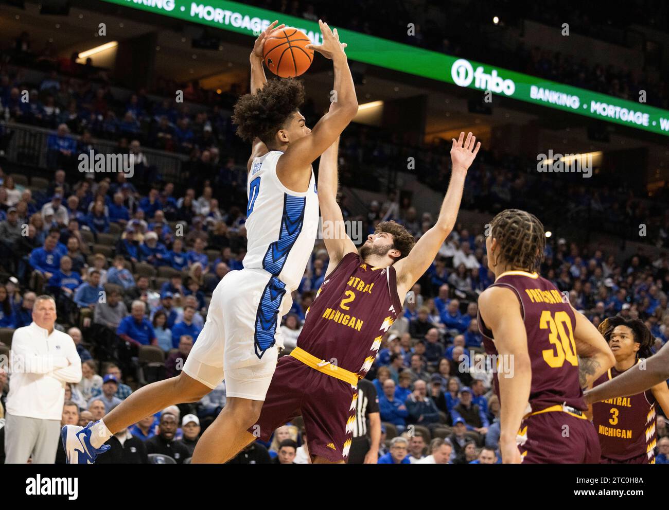 Creighton's Jasen Green (0) grabs a rebound against Central Michigan's ...