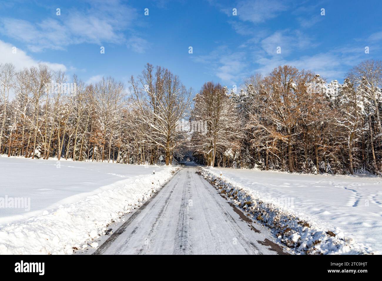Road in the countryside after heavy snowfall in central Europe Stock ...