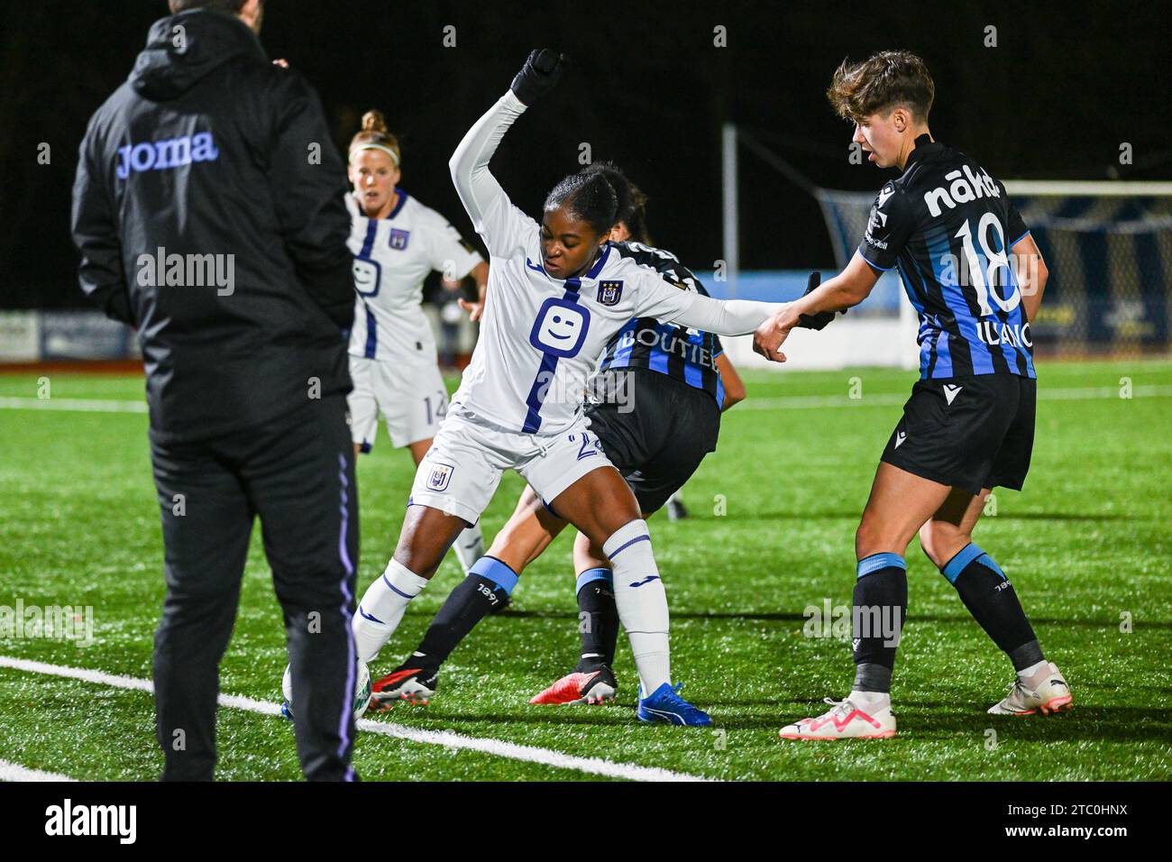 Knokke, Belgium. 09th Dec, 2023. Esther Buabadi (24) of Anderlecht and Isabelle Iliano (18) of ...