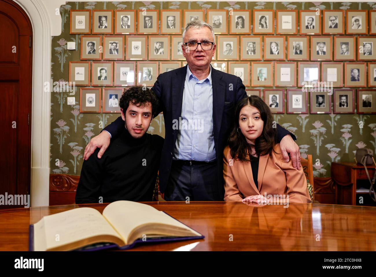 Oslo 20231209.The husband and children of this year's winner of the ...
