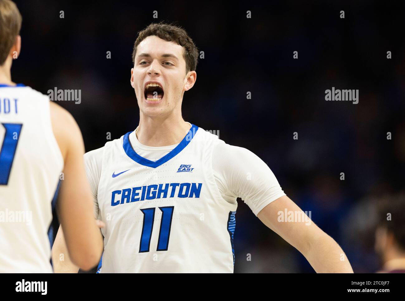 Creighton's Ryan Kalkbrenner (11) celebrates a basket with Isaac Traudt ...