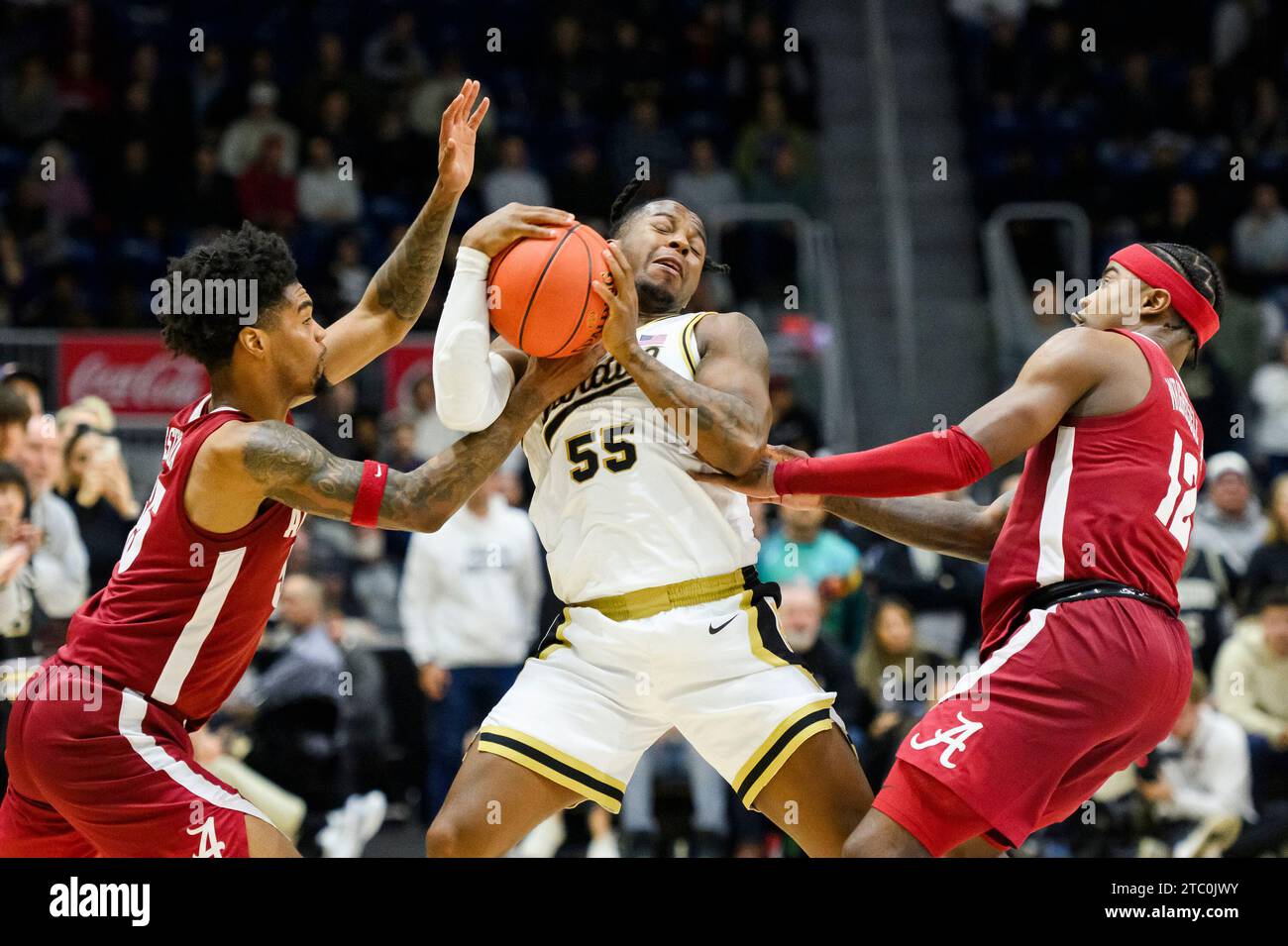 Purdue guard Lance Jones (55) is defended by Alabama guard Aaron ...