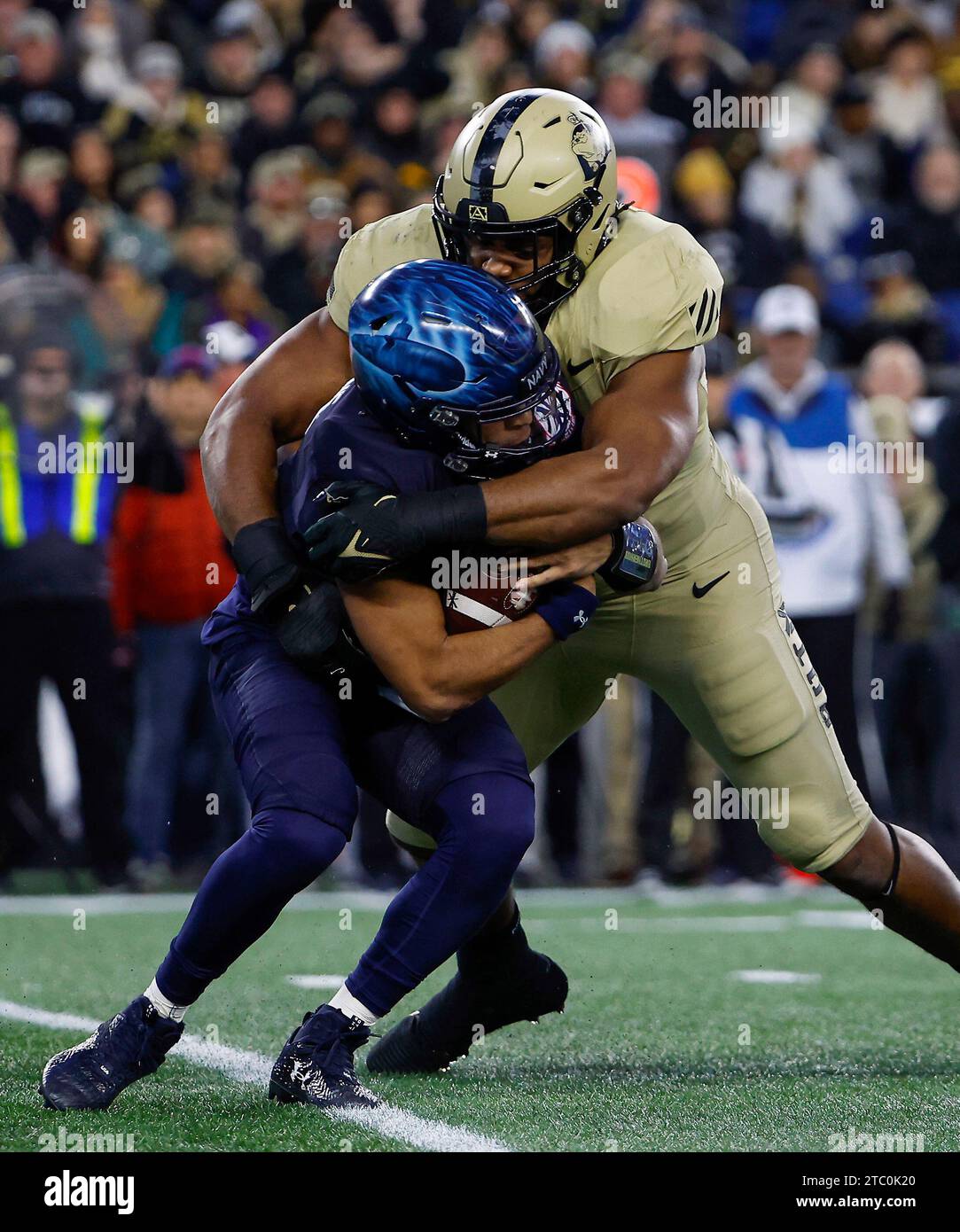 Army defensive lineman Nathaniel Smith sacks Navy quarterback Xavier ...