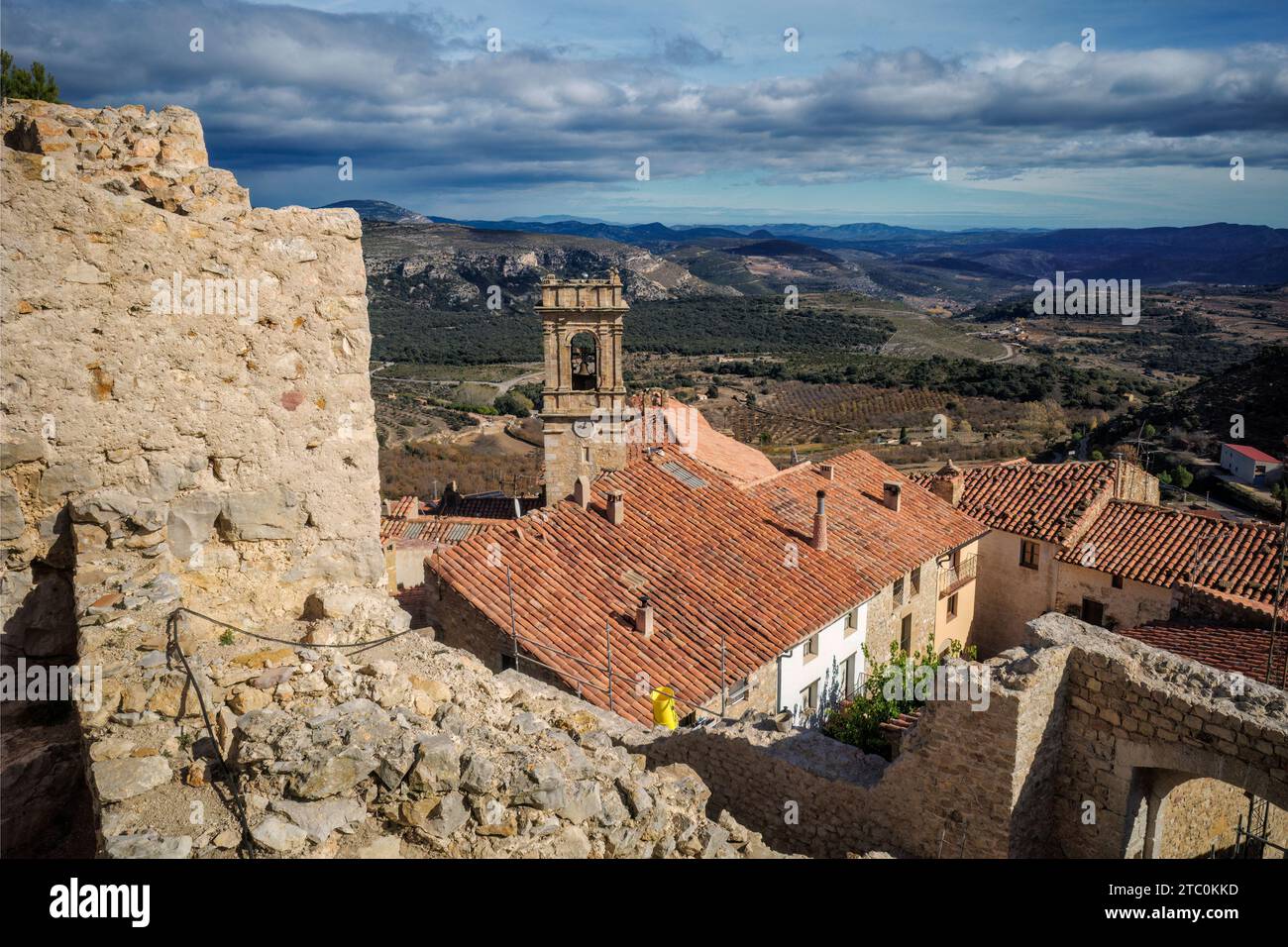 Photo in the castle square of the old hospital and the church tower of ...