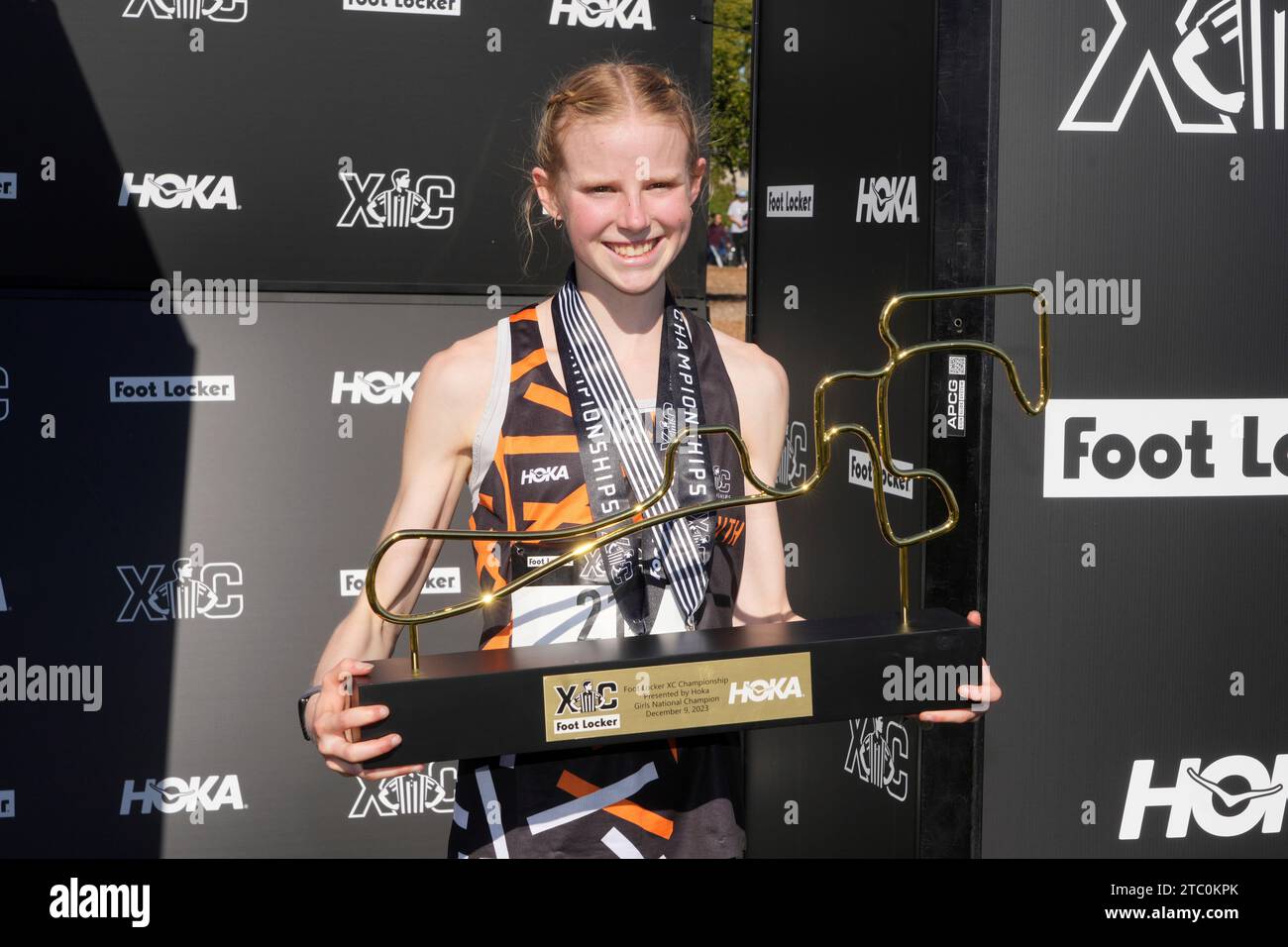 Elizabeth Leachman poses with trophy after winning the girls race in 16 ...