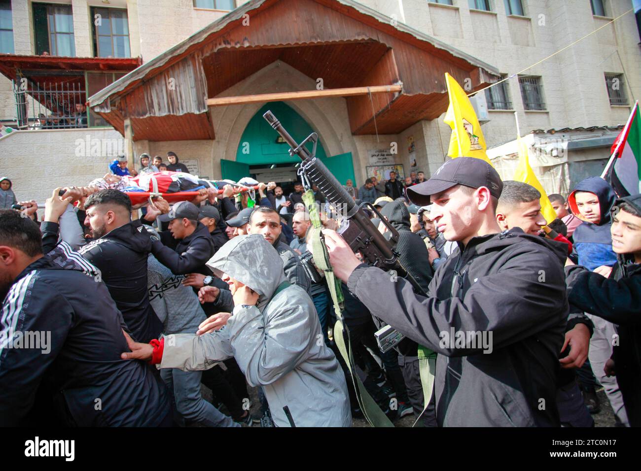 Nablus, Palestine. 09th Dec, 2023. (EDITOR'S NOTE: Image depicts death)Palestinian mourners and ...
