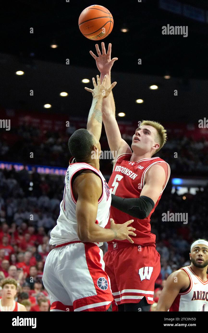 Wisconsin forward Tyler Wahl (5) shoots over Arizona forward Keshad ...