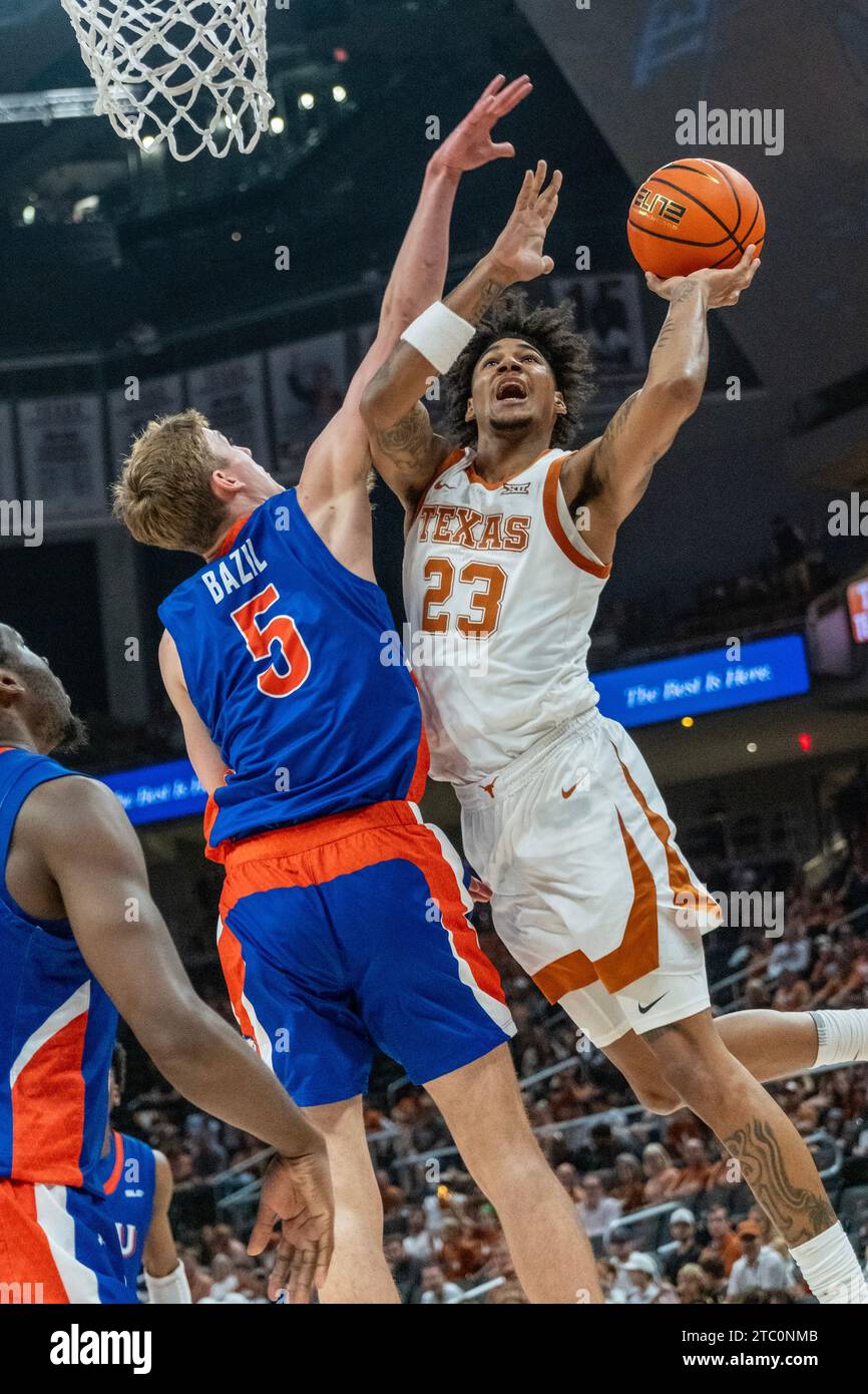 Texas, USA. 9th Dec, 2023. Dillon Mitchell #23 of the Texas Longhorns ...