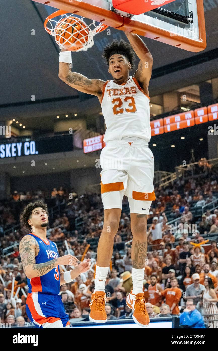 Texas, USA. 9th Dec, 2023. Dillon Mitchell #23 of the Texas Longhorns ...