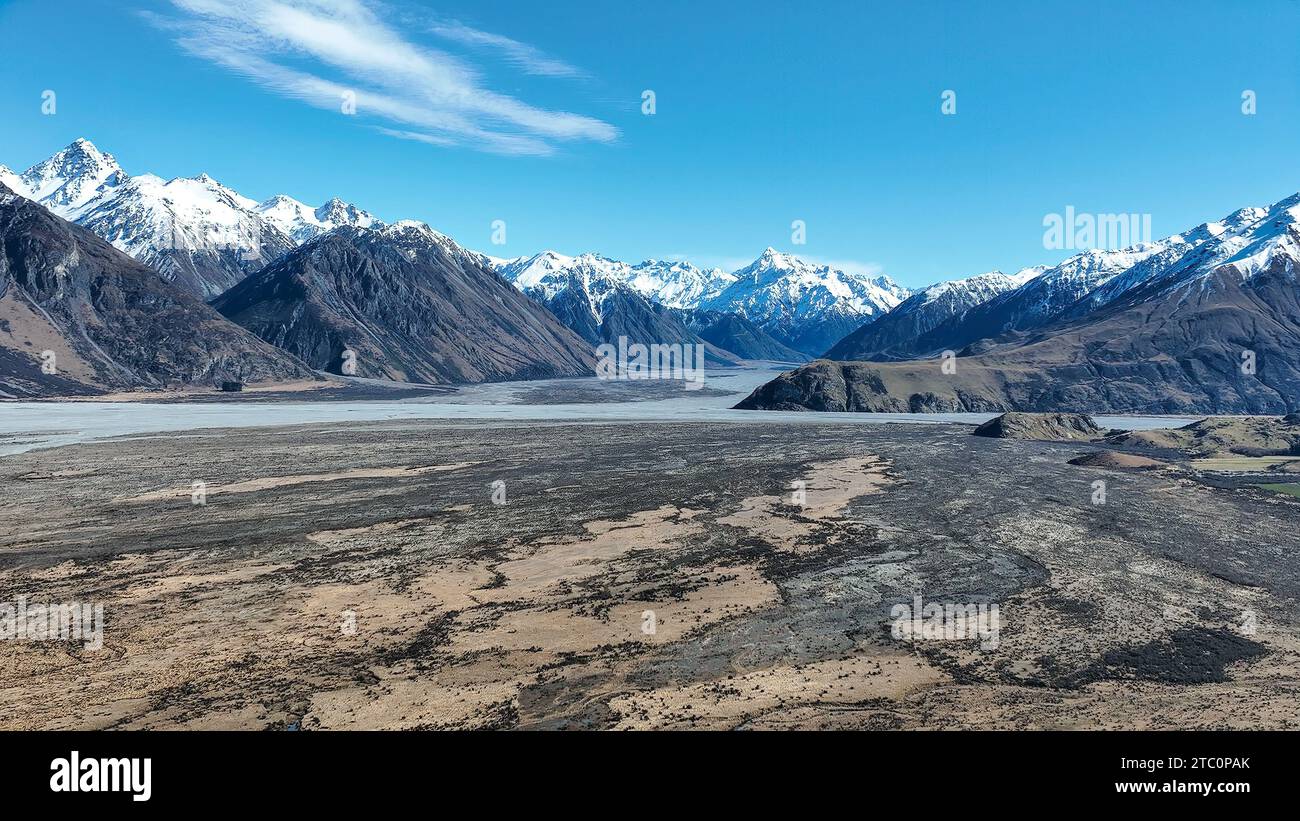 The dry arid alpine Hakatere conservation park bordered by the snow ...