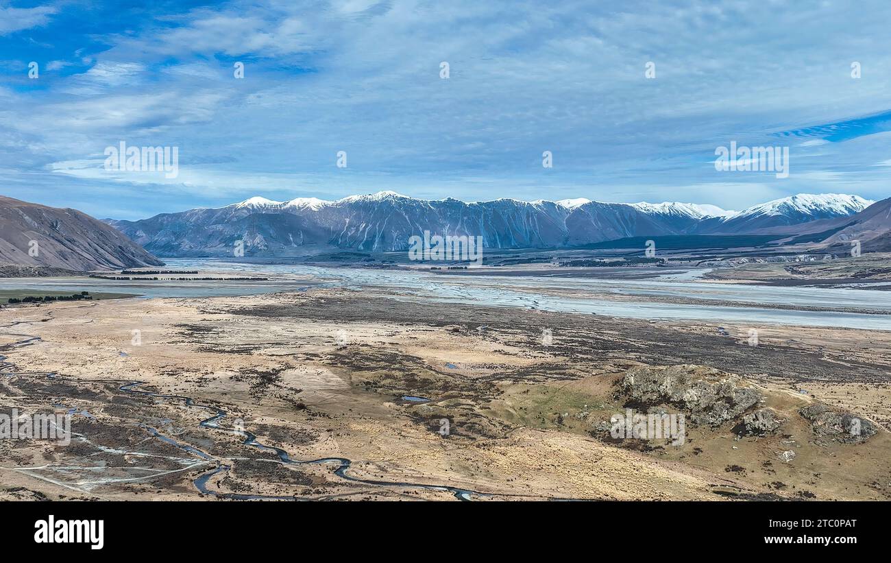 The dry arid alpine Hakatere conservation park bordered by the snow ...