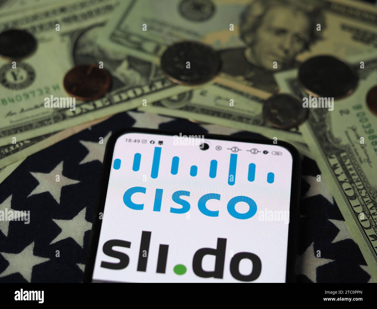 In this photo illustration, a Slido part of Cisco logo seen displayed ...