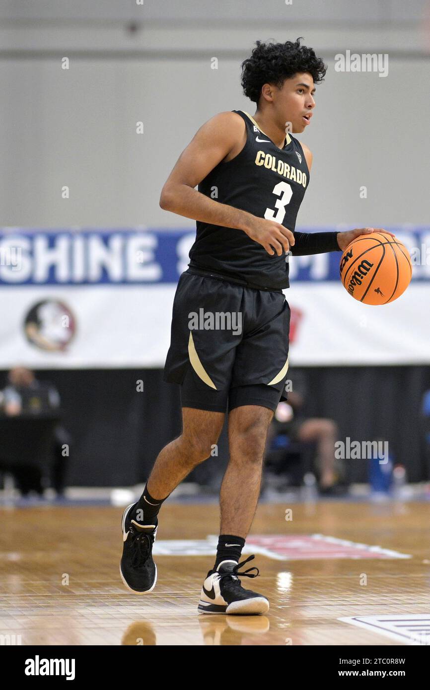 Colorado guard Julian Hammond III (3) brings the ball up the court ...