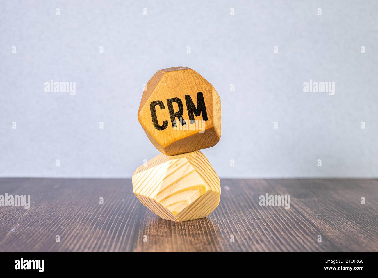 CRM banner, Customer Relationship Management, on wooden cubes over blur ...