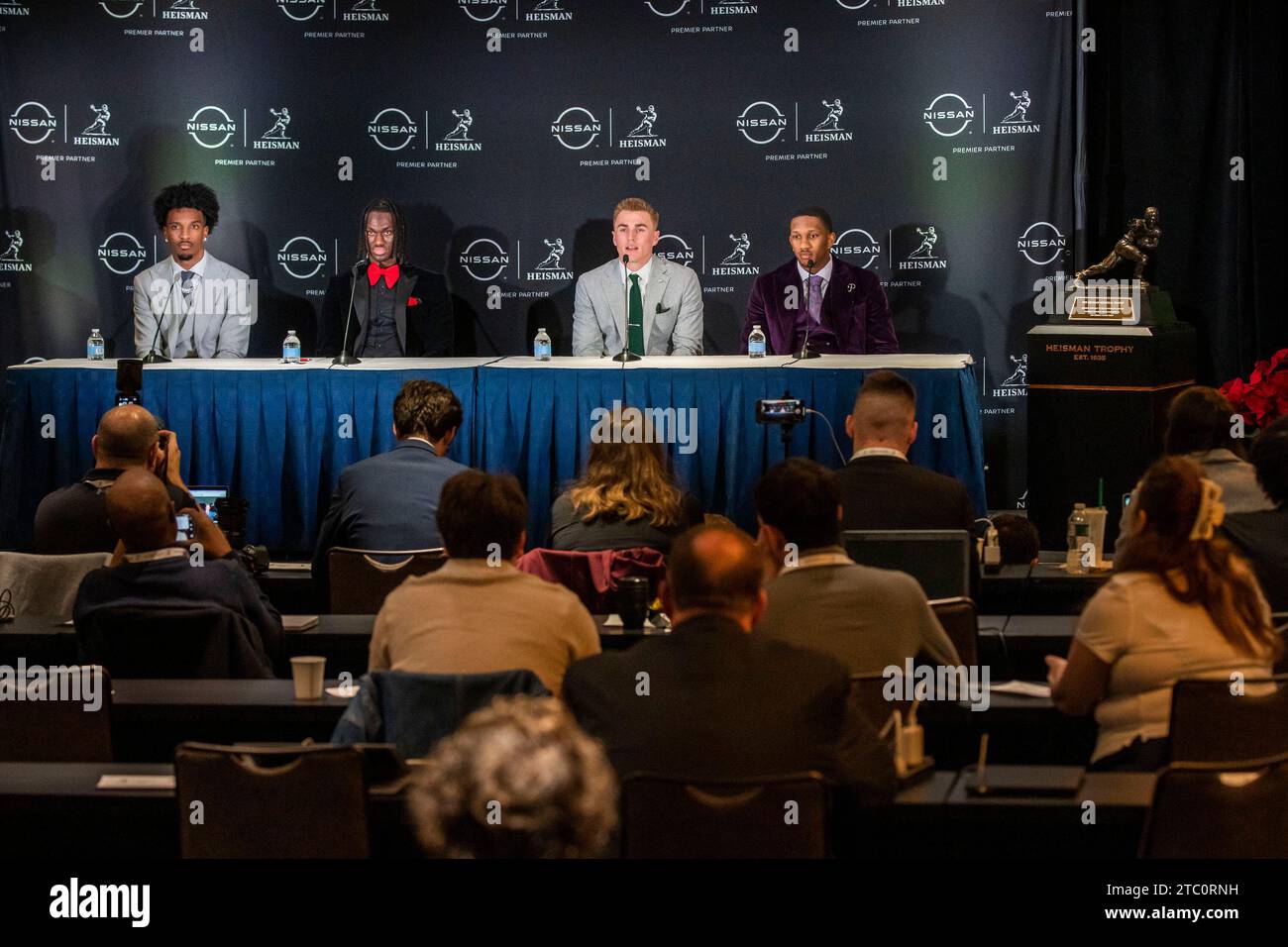 Heisman Trophy finalists, from left, LSU quarterback Jayden Daniels ...
