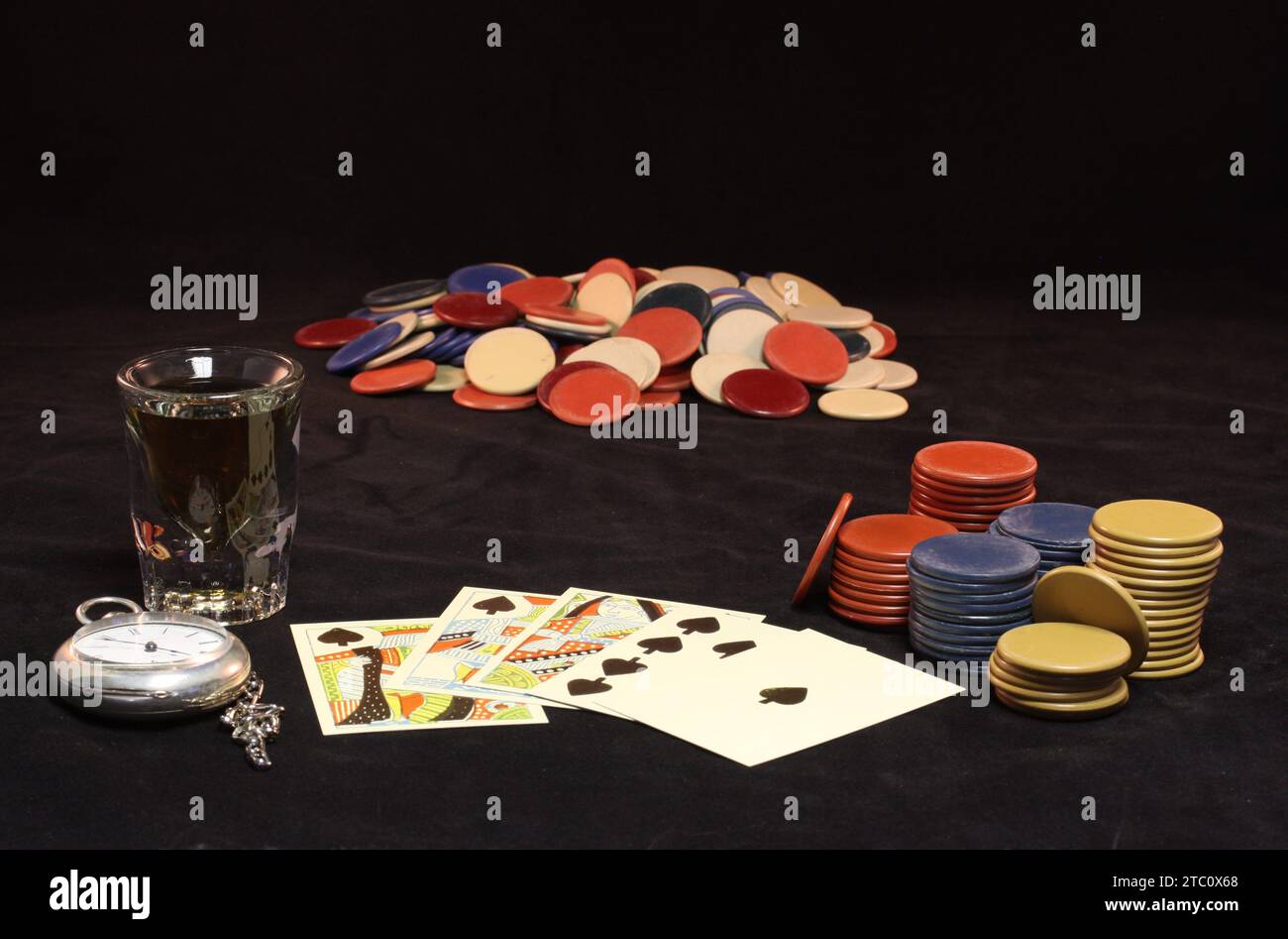 Royal flush with chips on poker table Stock Photo - Alamy
