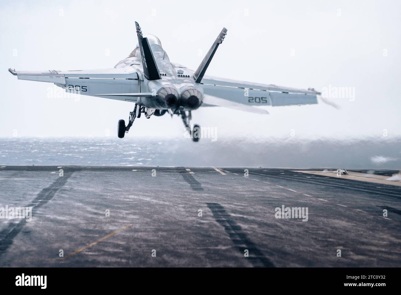 An F/A 18 Hornet, from Strike Fighter Squadron (VFA) 103, taxies on the ...