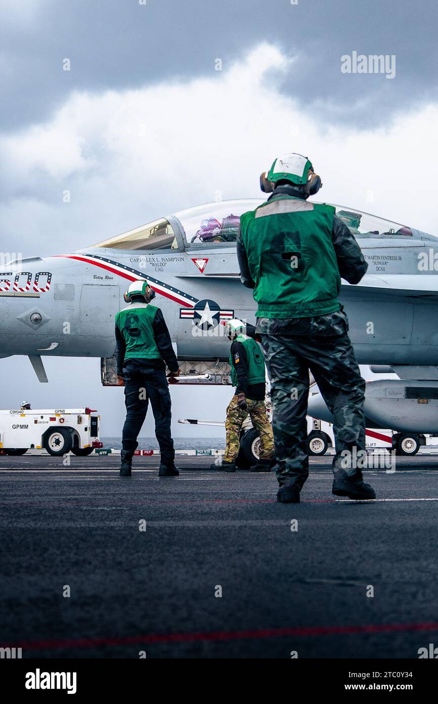 An F/A 18 Hornet, from Strike Fighter Squadron (VFA) 103, taxies on the ...
