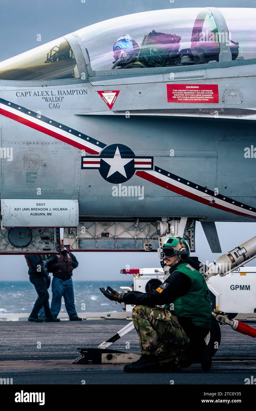 An F/A 18 Hornet, from Strike Fighter Squadron (VFA) 103, taxies on the ...
