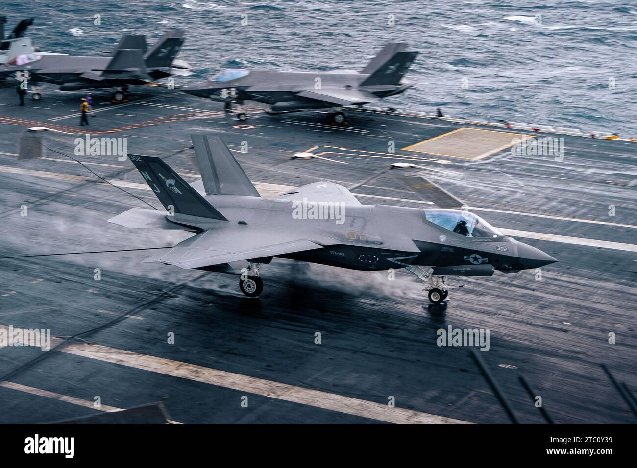 An F-35C Lightning II, from Strike Fighter Squadron (VFA) 147, lands on ...