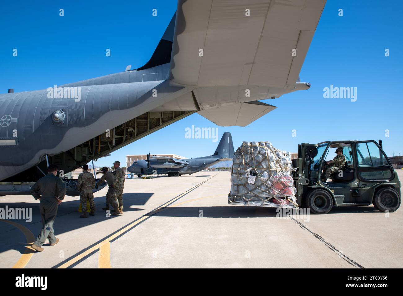 Airmen assigned to the 920th Rescue Wing offload cargo from a 920th RQW ...